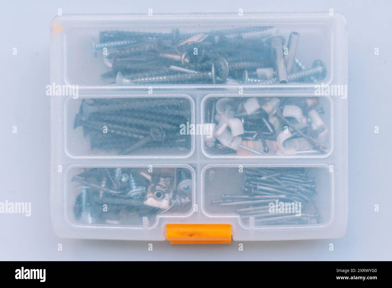 Closed plastic box with special compartments for screws and nails Stock ...