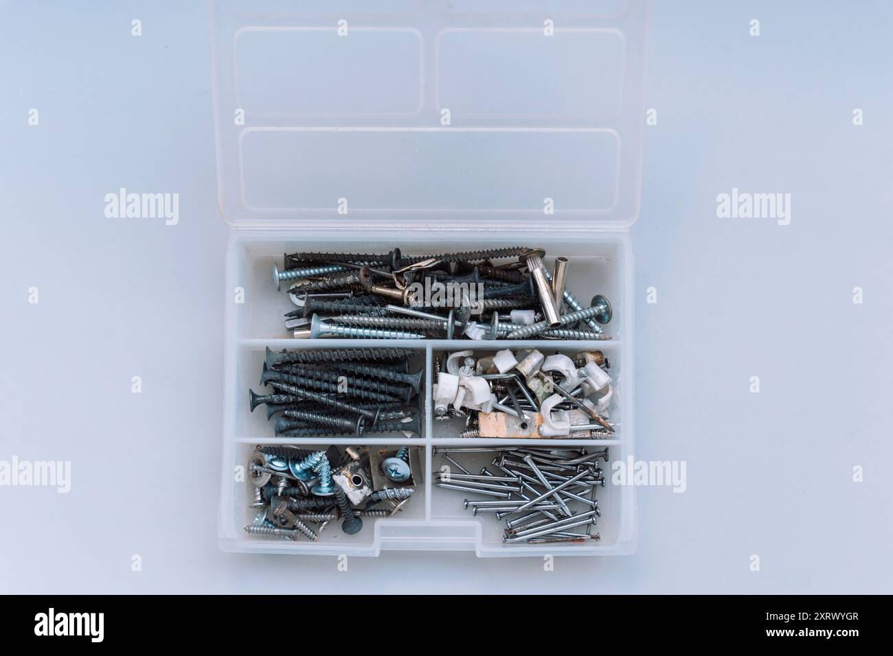 Open plastic box with special compartments for screws and nails Stock ...