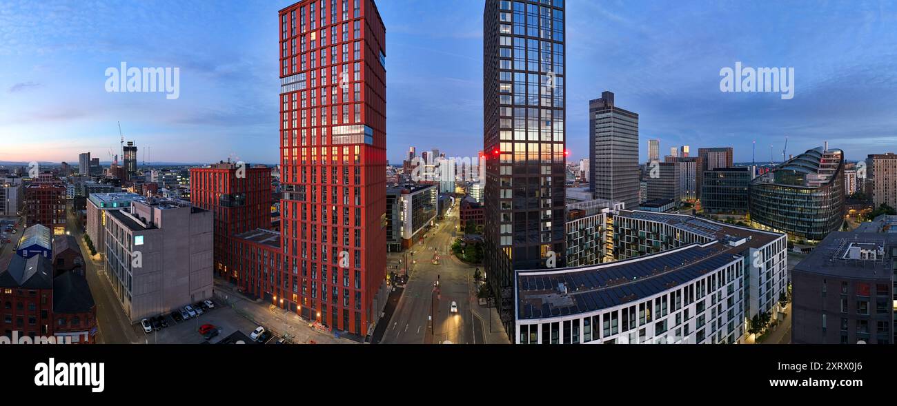 Aerial view of modern high-rises with sunrise reflected on glass ...
