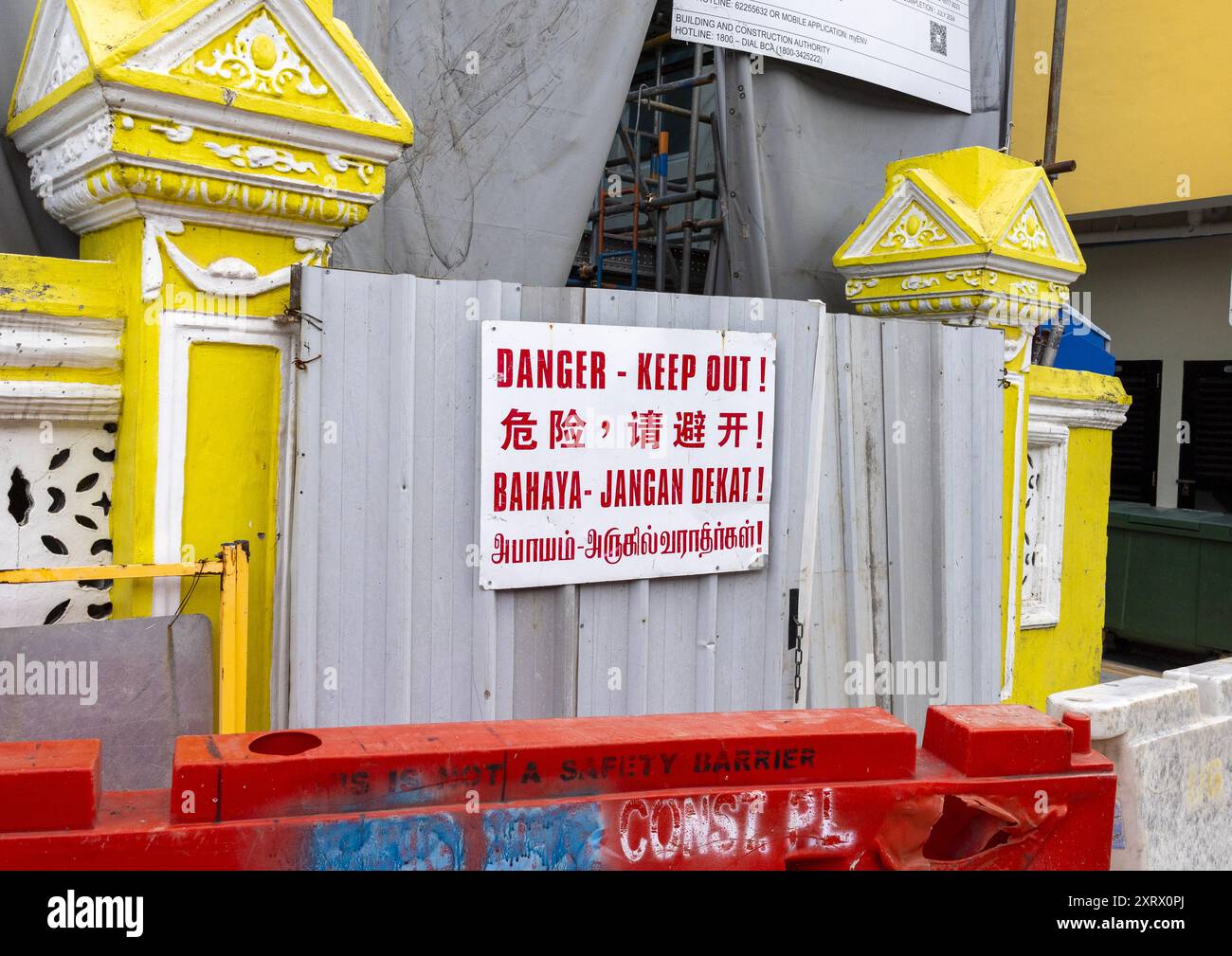 Danger sign in front of a renovatedn heritage shophouse, Central Region ...
