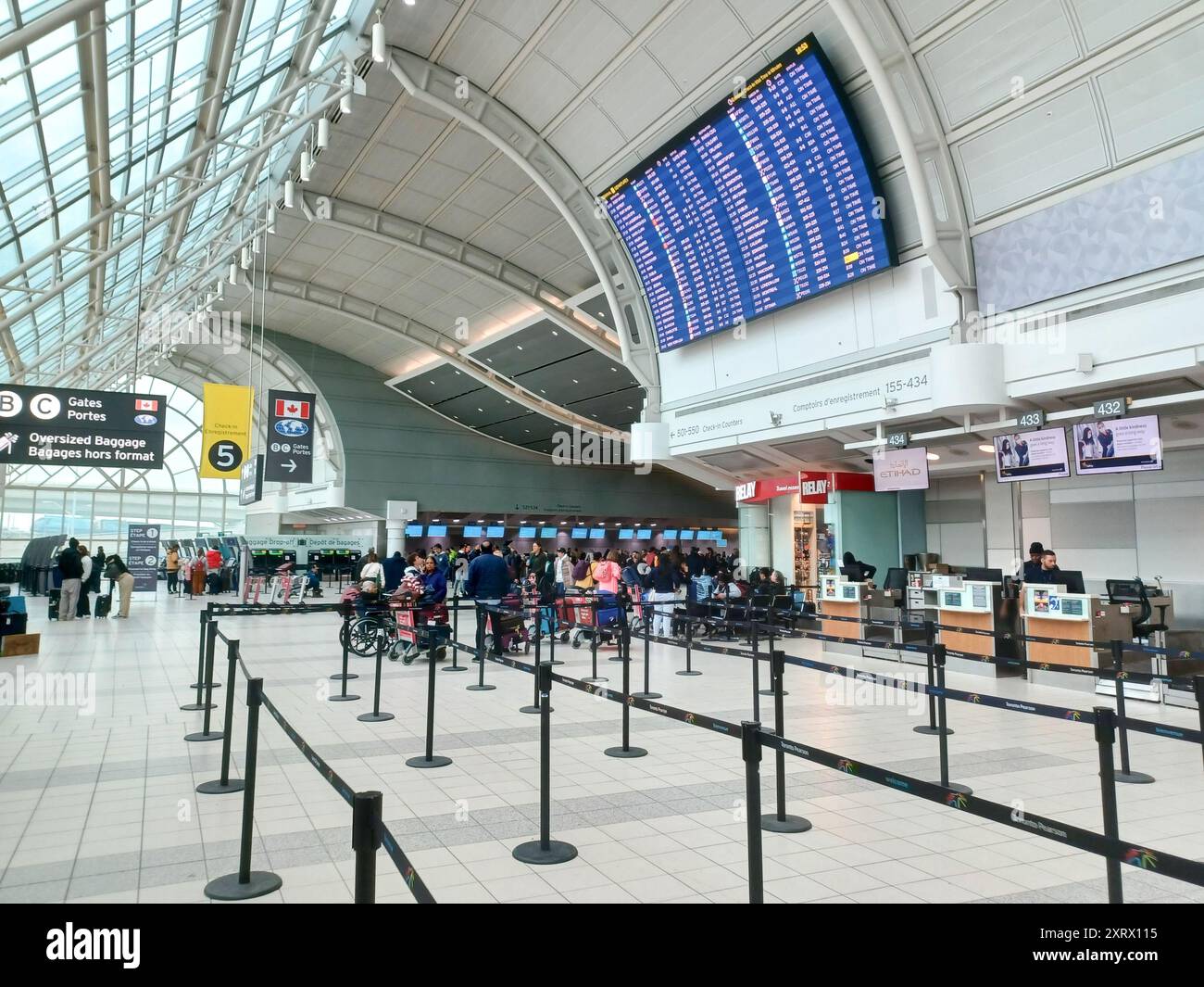 Toronto, ON, Canada - June 21, 2024: Inside view of the Toronto Pearson International Airport ...