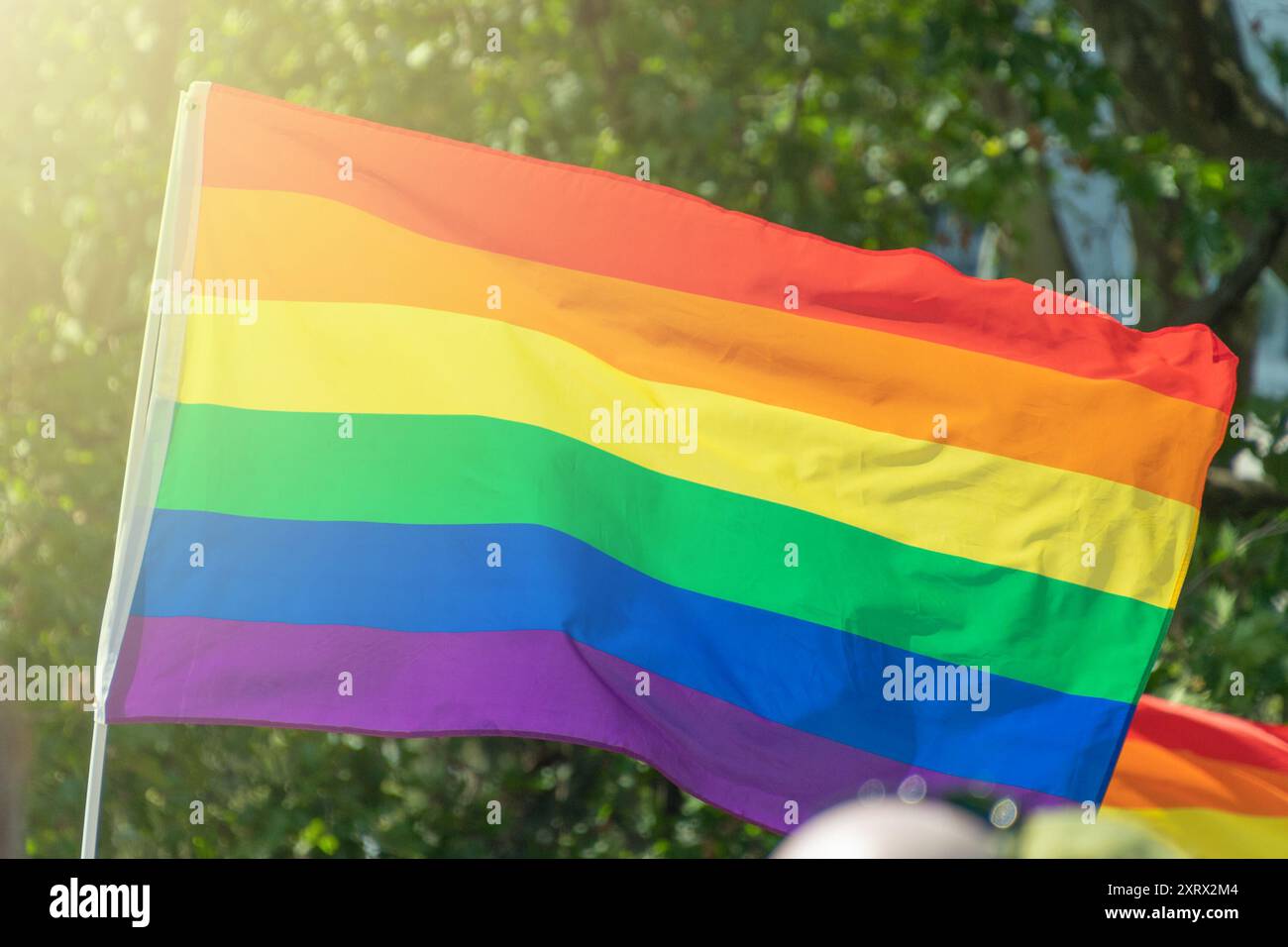 Rainbow flag at the LGBT community pride parade. gay pride parade Stock ...