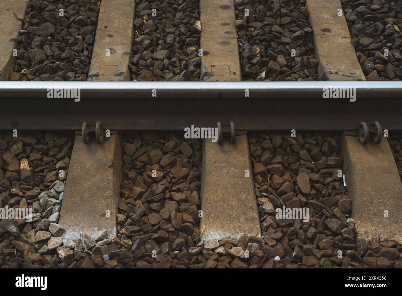 Railway rail, sleepers across, at one of the stations. Railway tracks ...