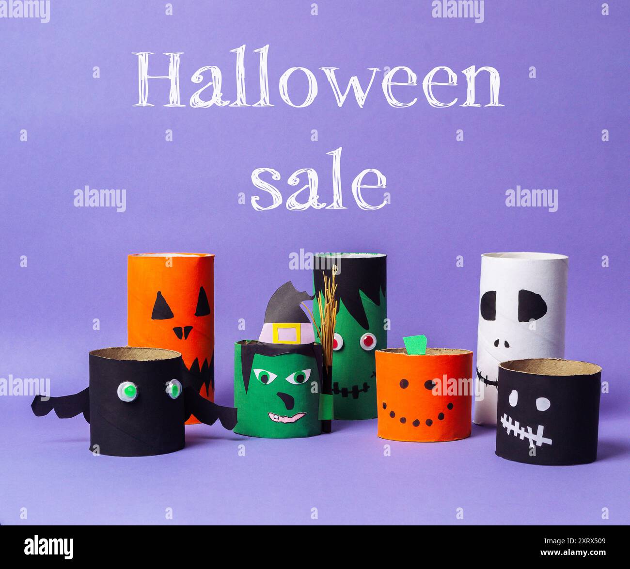 Halloween sale with Halloween themed paper tubes. The tubes are ...