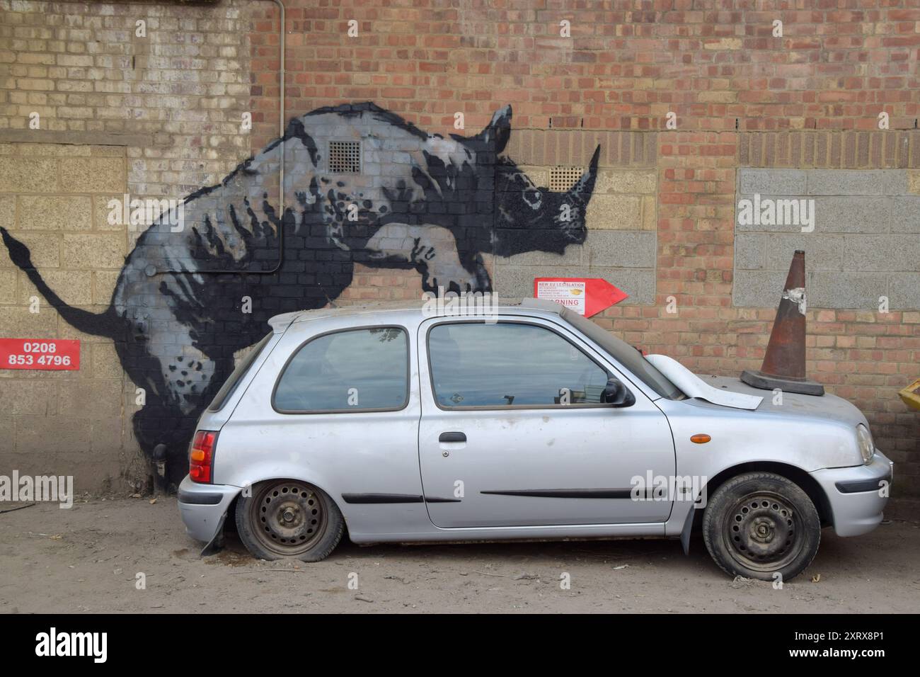 Banksy rhino car hi-res stock photography and images - Alamy