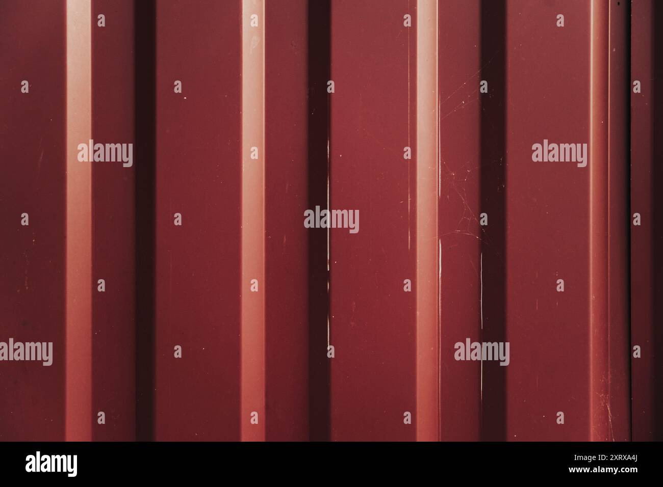 An iron, profile, red fence. Iron fence background Stock Photo - Alamy