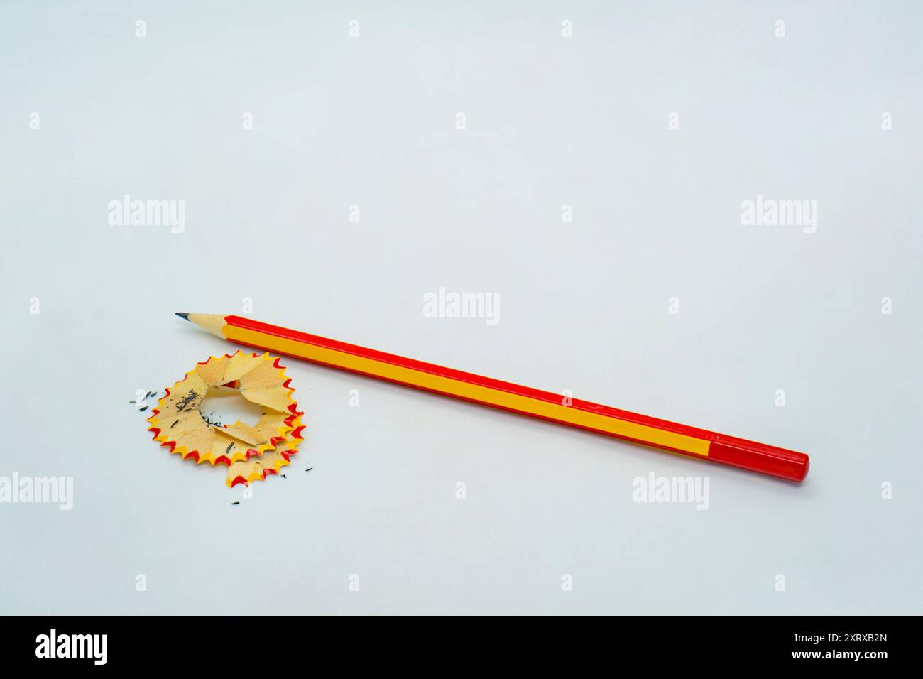 Pencil Yellow red writing lead wooden pen with sharpener isolated ...