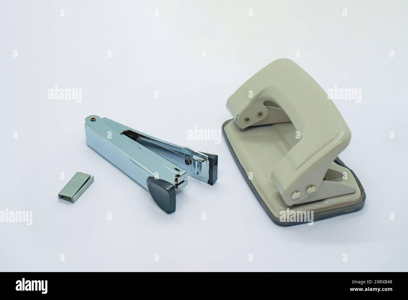 Office Supplies of Paper Punching Pad Stapler Staples Pin Isolated in ...