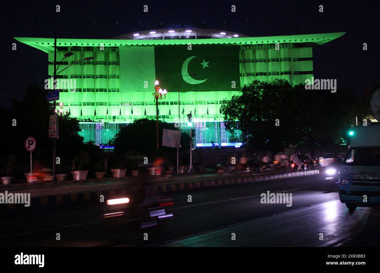 A beautiful illuminated view of lighting at WAPDA House building to ...