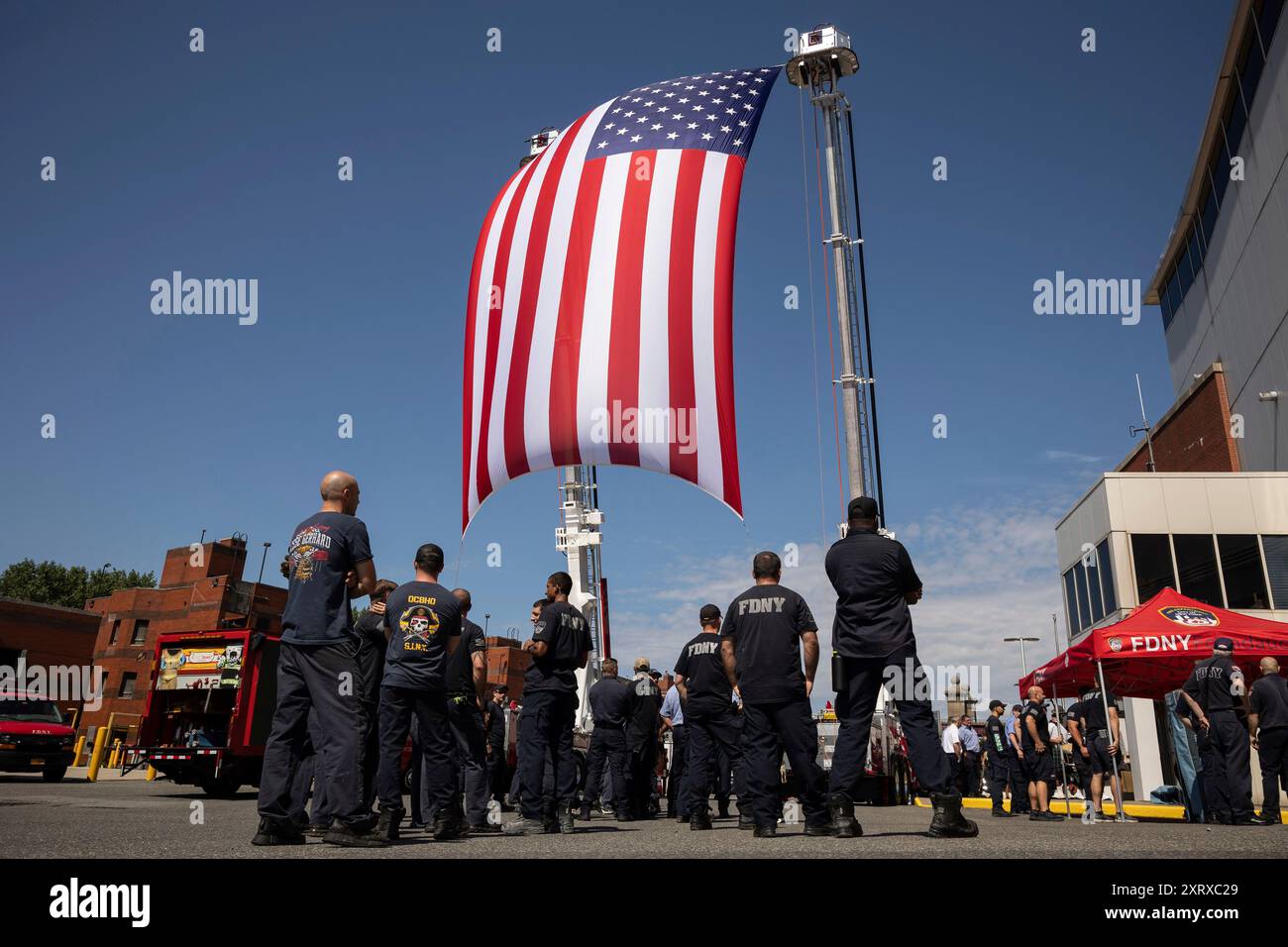 An American flag is raised during a FDNY Fire Commissioner's swearing ...