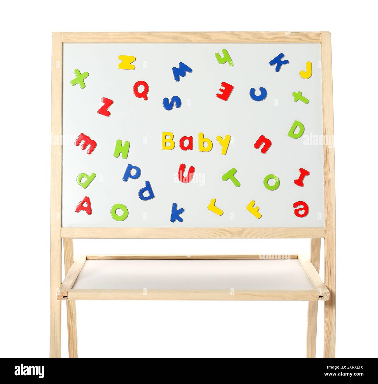 Word Baby made of magnetic letters on board against white background ...