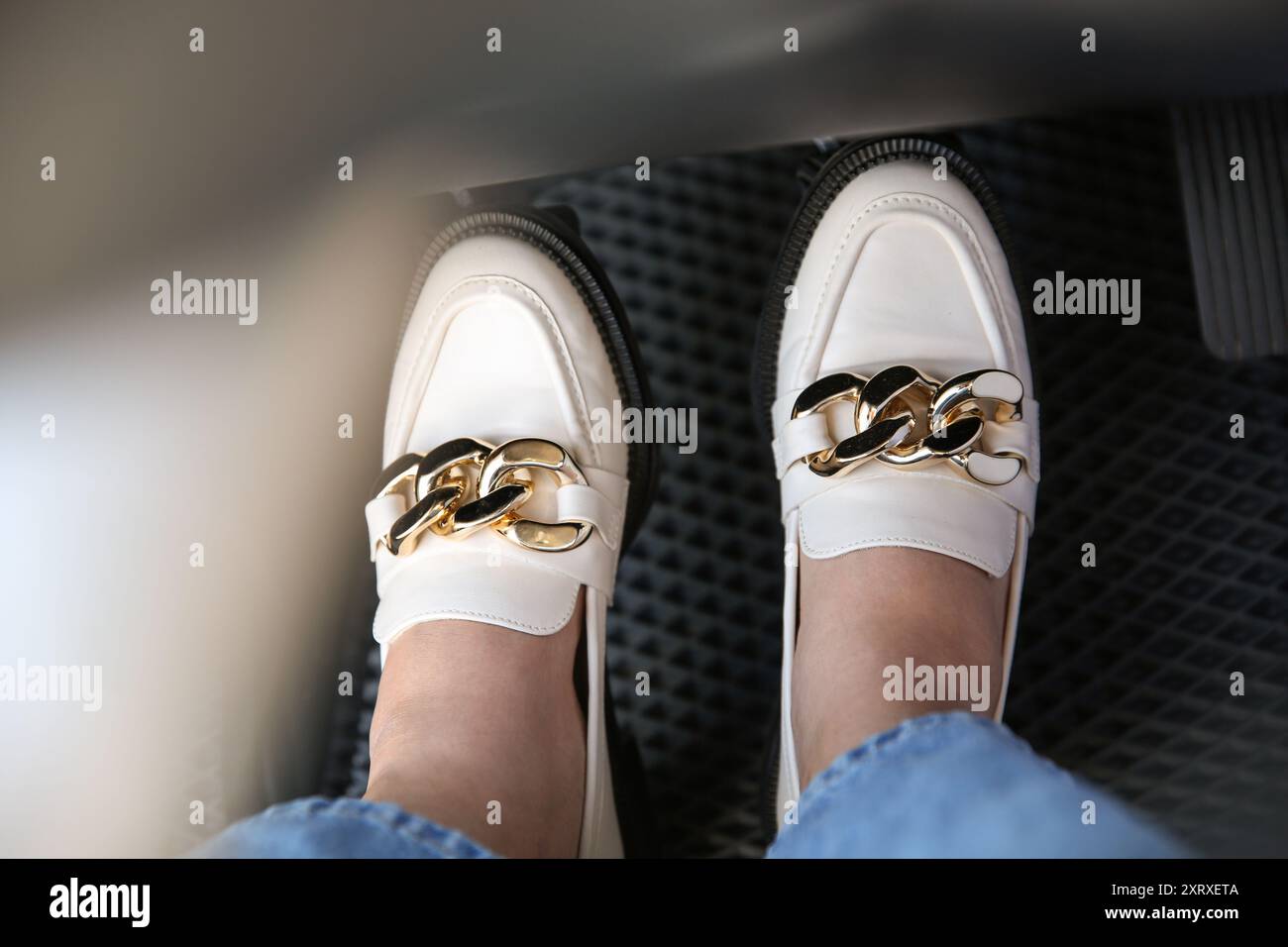 Woman in driving car legs hi-res stock photography and images - Alamy