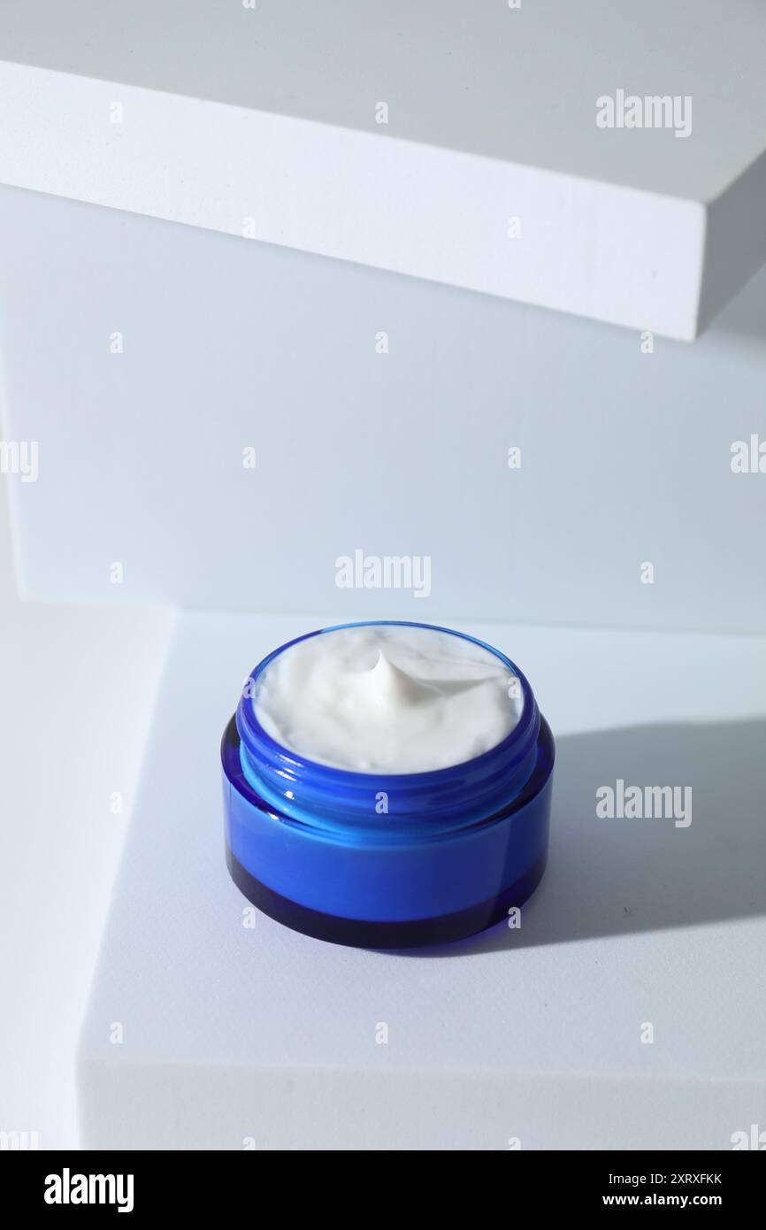Stylish presentation of facial cream on white background Stock Photo ...