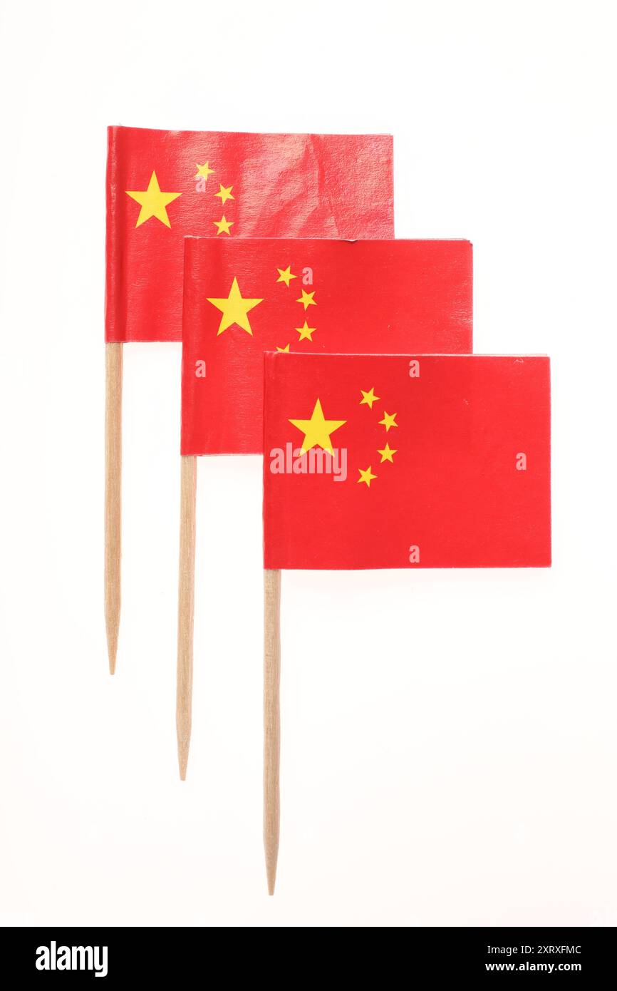 Small paper flags of China isolated on white Stock Photo - Alamy