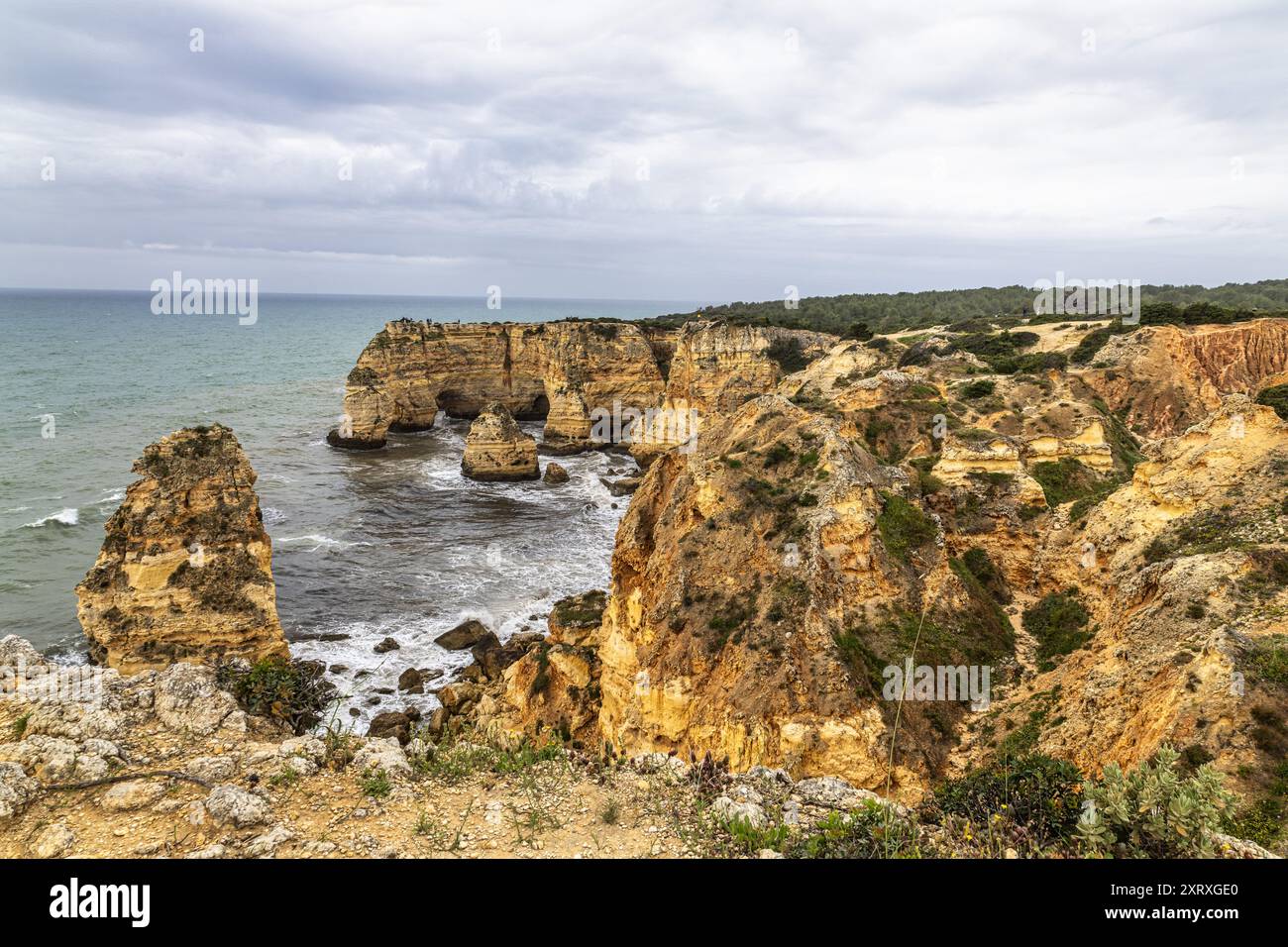 Praia da Marinha Beach among rock islets and cliffs seen from Seven ...