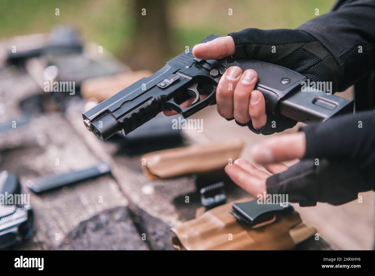 instructor in sport shooting to test your weapons in nature Stock Photo ...