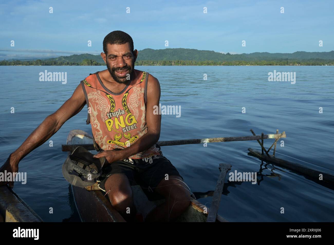 PAPUA NEW GUINEA, Madang, Bismarck Sea, small scale fisherman in Dinghy ...