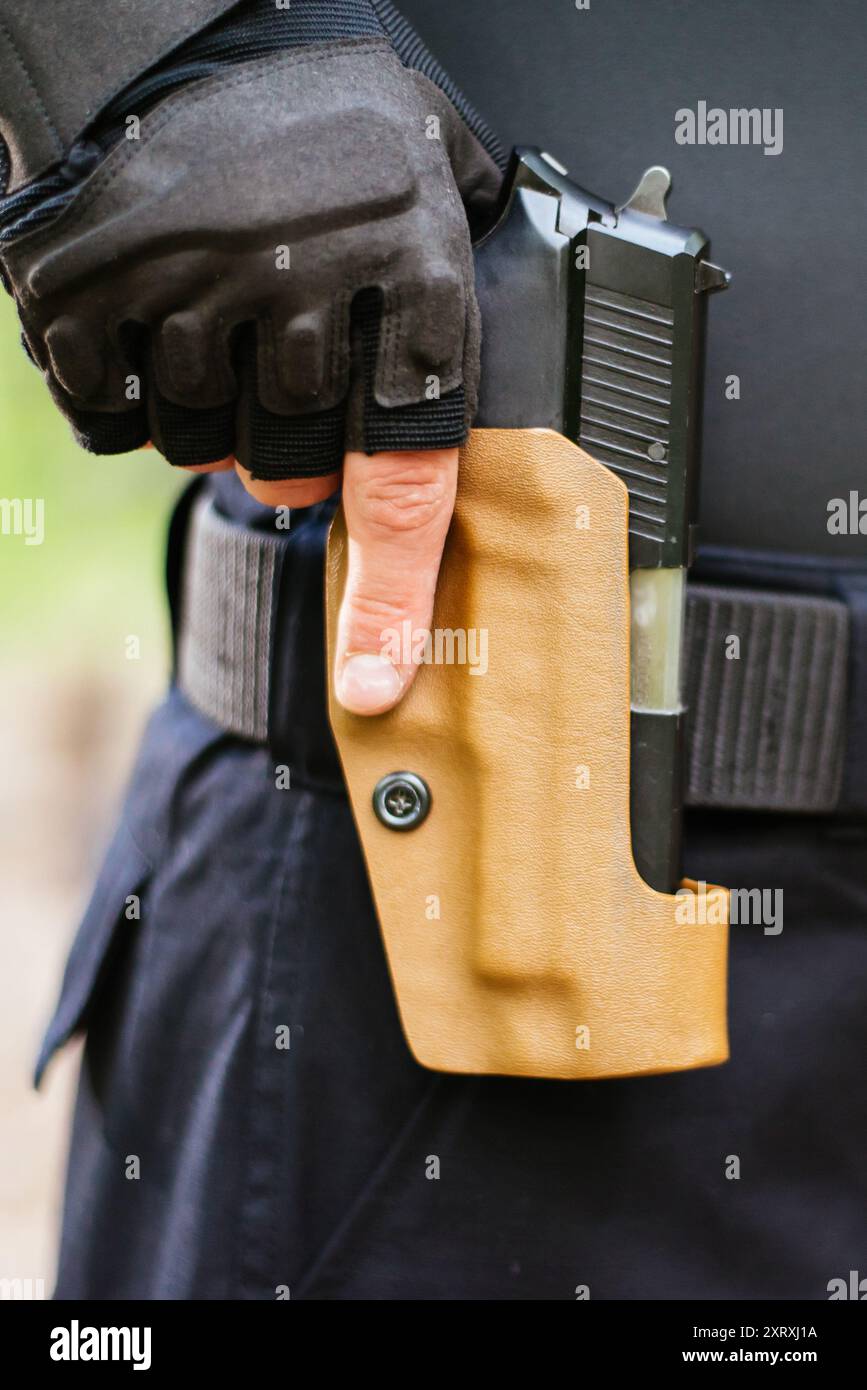 White revolver gun in holster hi-res stock photography and images - Alamy