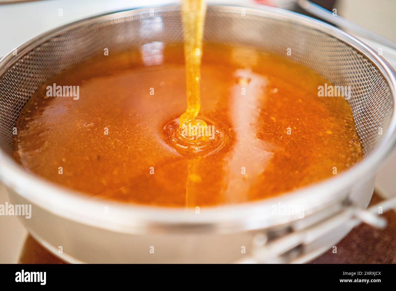 Honeycomb is overflowing with delicious honey hi-res stock photography ...