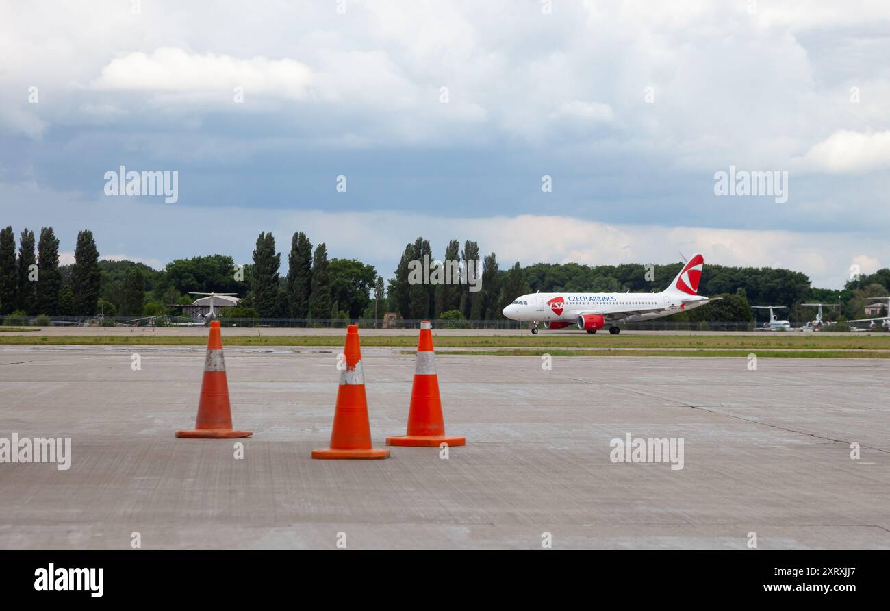 Passenger plane travelCzech airlines in airport. Arrival of the ...