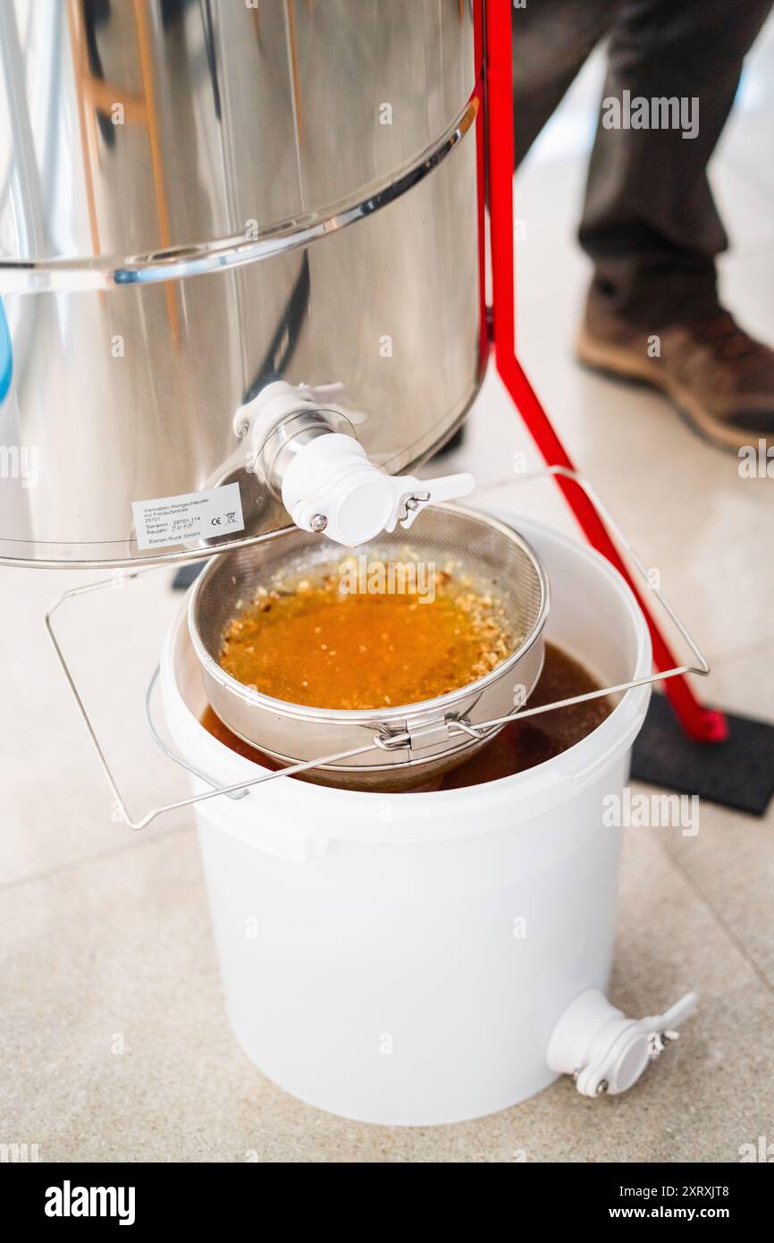 Centrifugal Extractor Barrel with First Filtered Batch of Honey in a ...