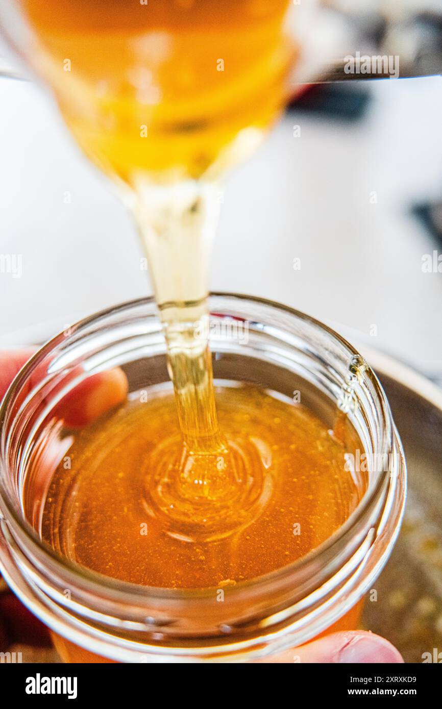 Honeycomb is overflowing with delicious honey hi-res stock photography ...
