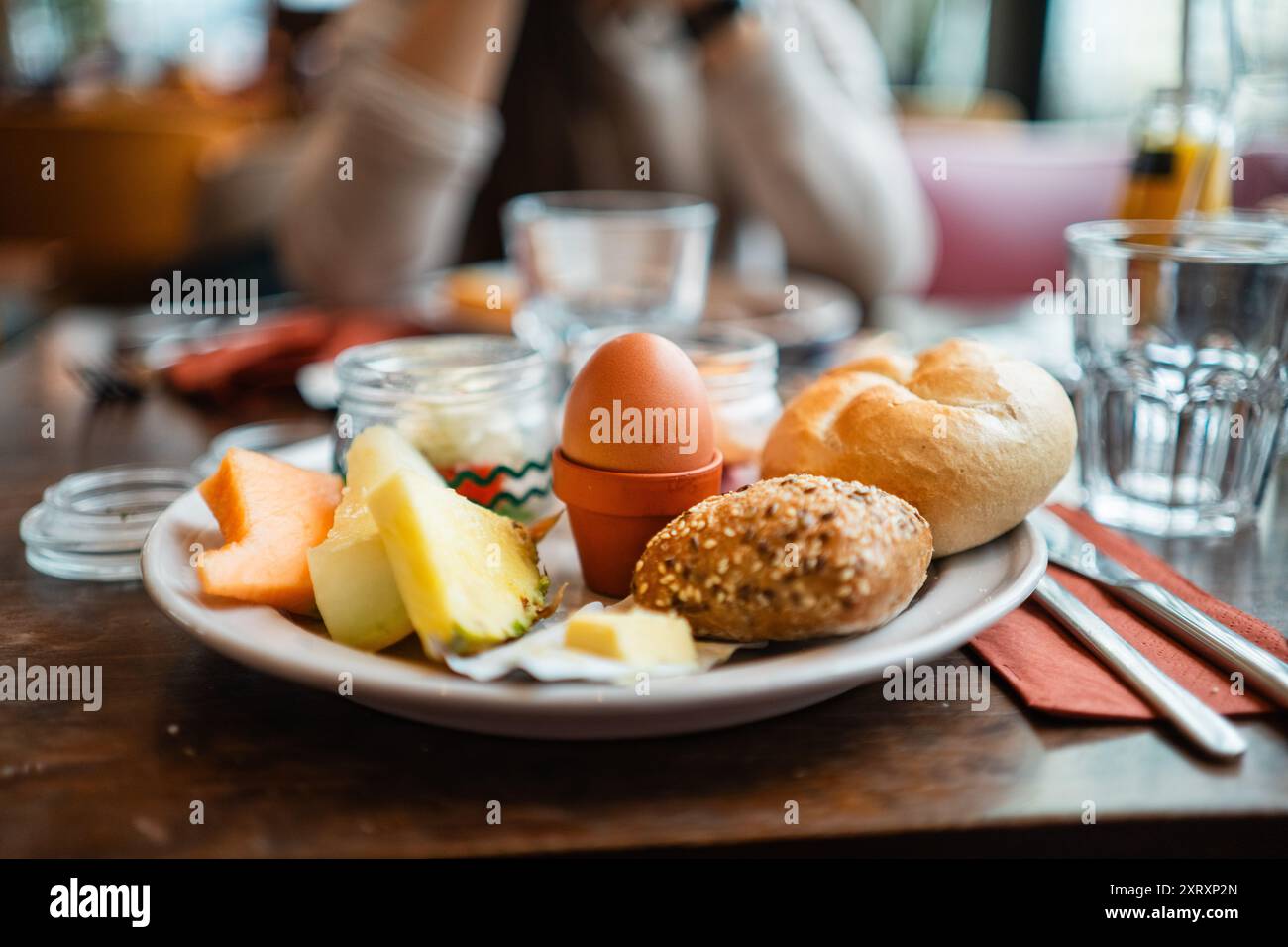 Full Plate of Bread Fruits and Boiled Egg for Breakfast Stock Photo - Alamy