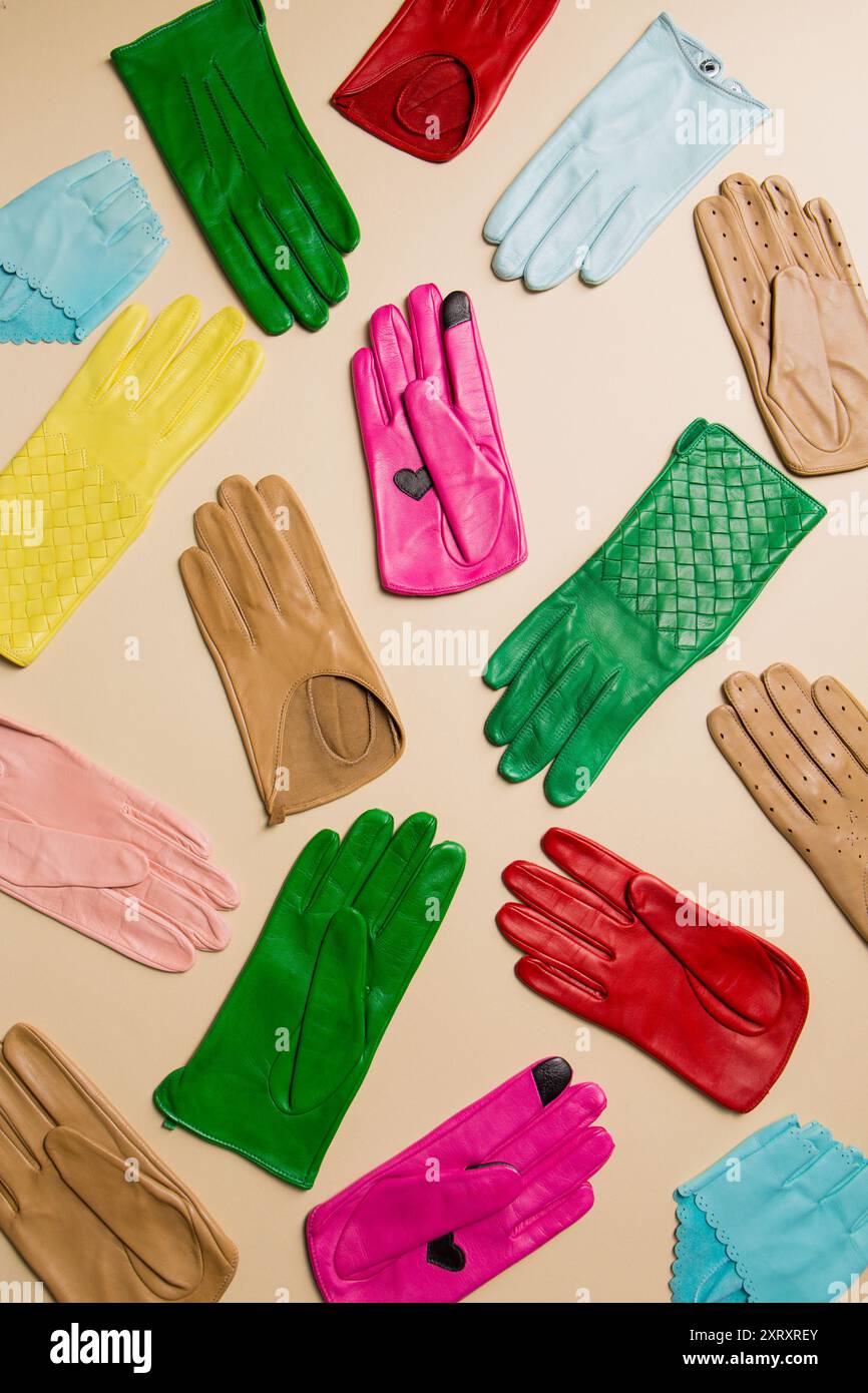 Bright, multi-colored, fashionable gloves with decorative inserts ...