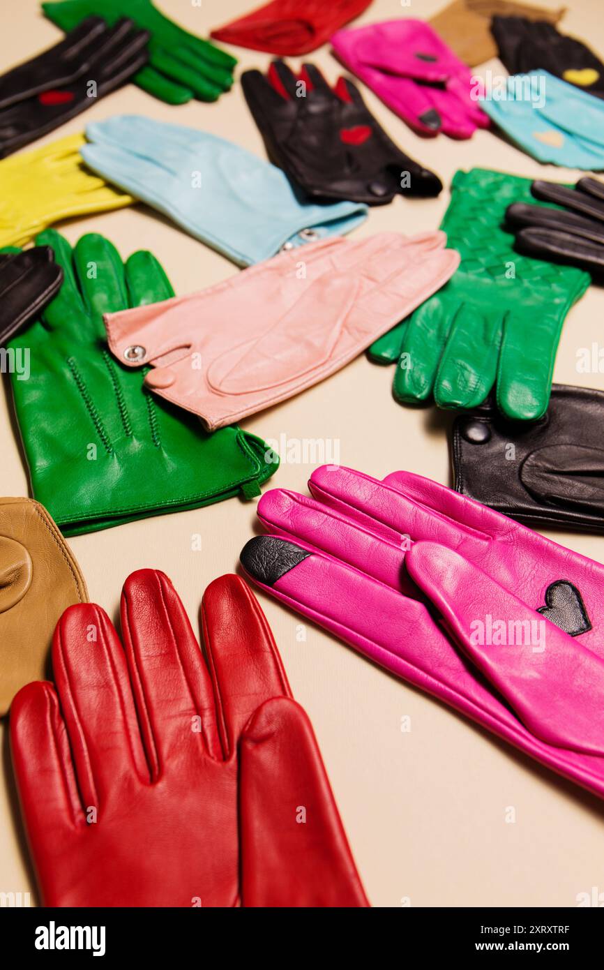 Bright, multi-colored, fashionable gloves with decorative inserts ...