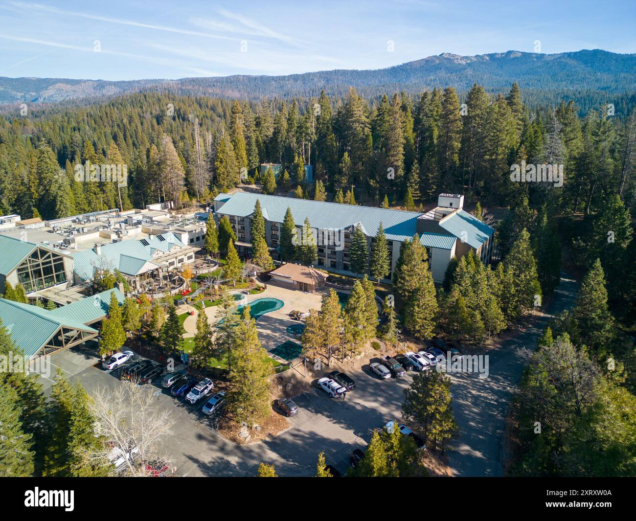An aerial view of a large resort surrounded by a forest in Tenaya Lodge ...