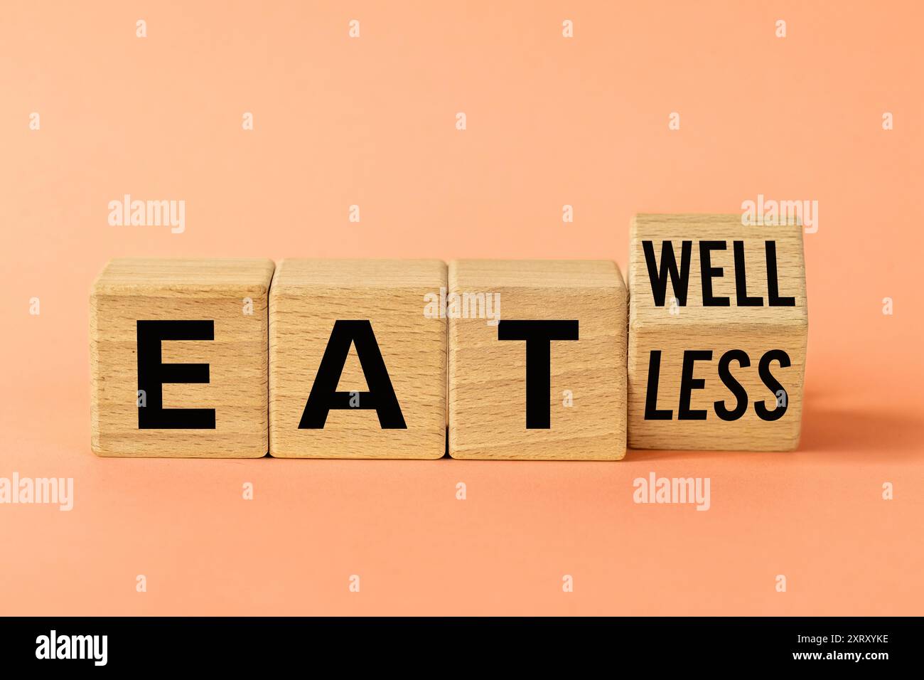 Motivational symbol Eat Less vs Eat Well. Conceptual words. Rotated ...