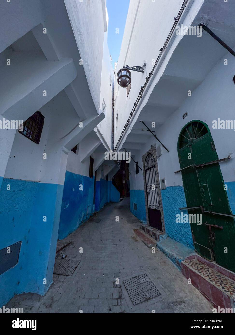 Narrow street in Tangier medina Stock Photo - Alamy