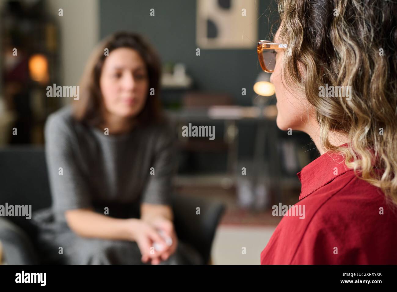 Engaging in Deep Conversation with a Counselor Stock Photo - Alamy