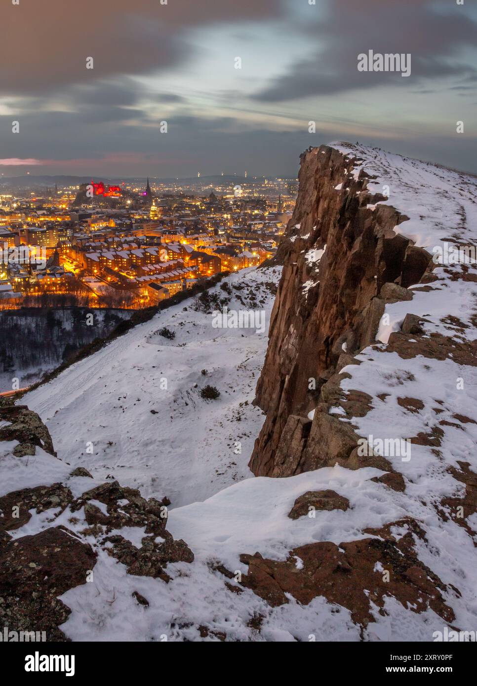 Vertical view of Edinburgh, Scotland, covered in snow from Arthur Seat ...