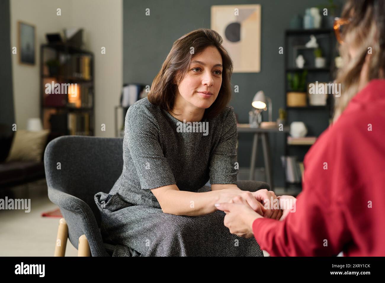 Counseling Session with Female Therapist Holding Hands Stock Photo - Alamy