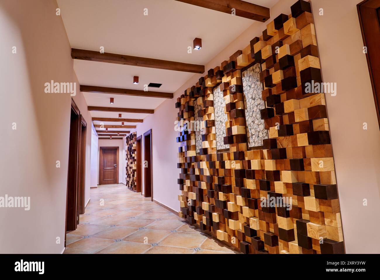 Wooden panel made of timber with inserts of paintings in the hotel ...