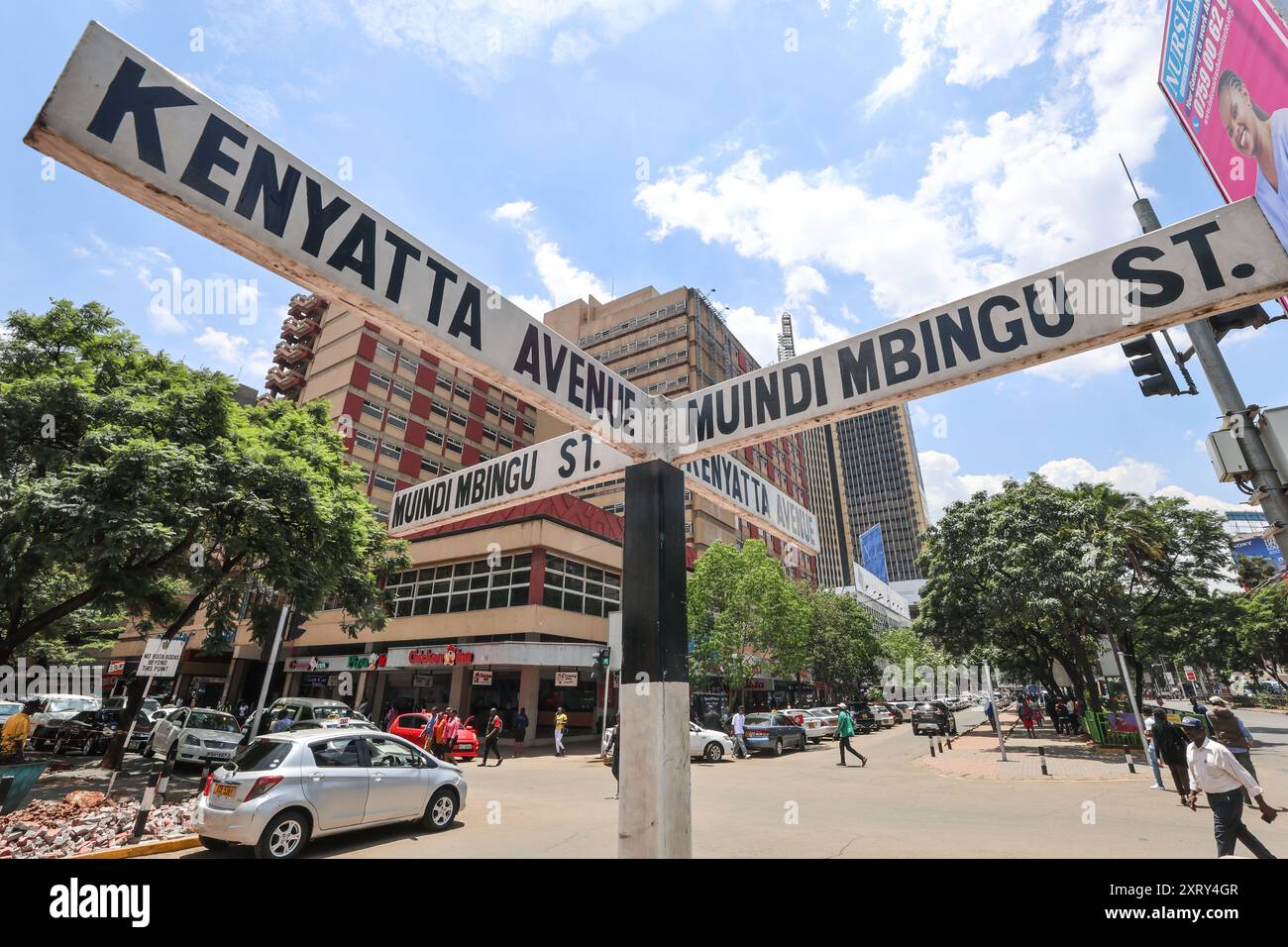 View of a street sign bearing the names of streets in downtown Nairobi ...