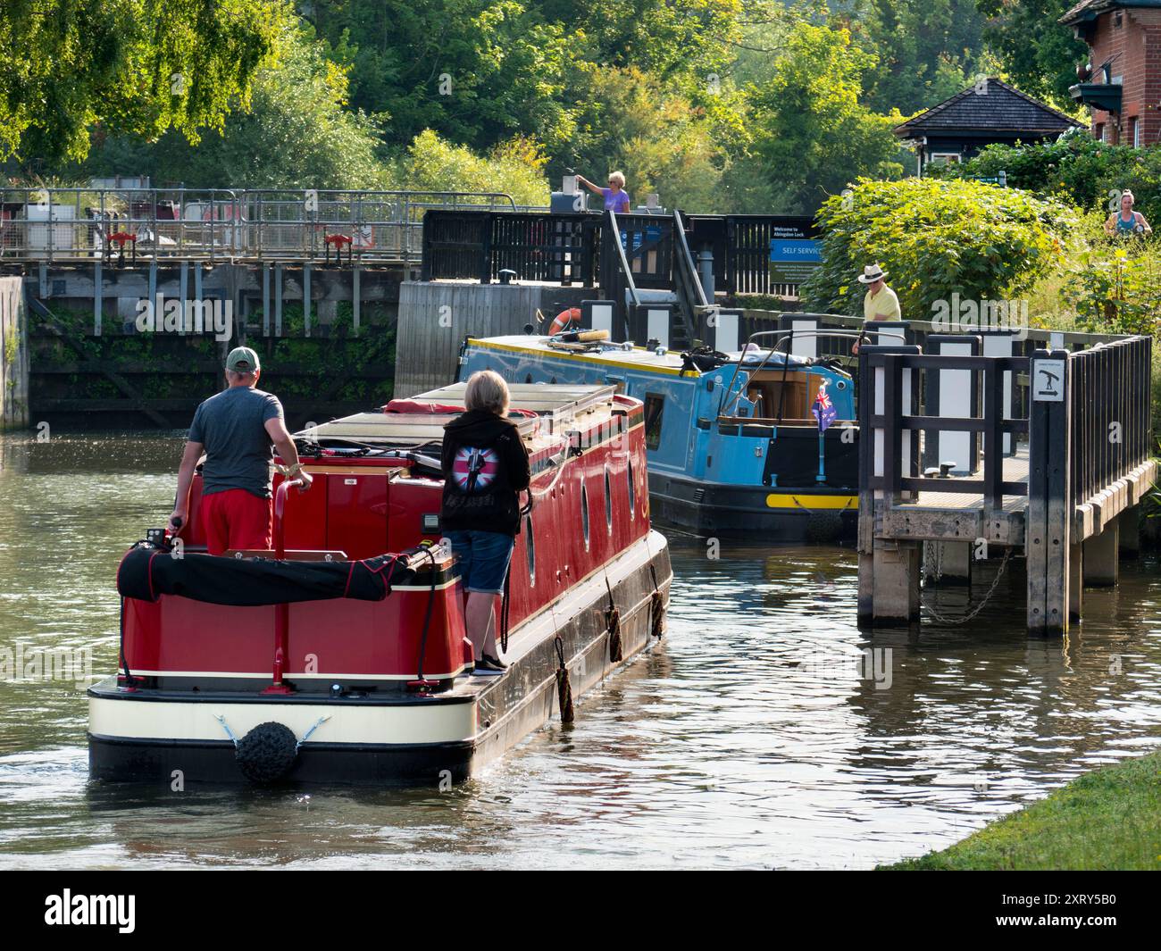 Houseboats approaching the gates of Abingdon Lock on the Thames. These ...