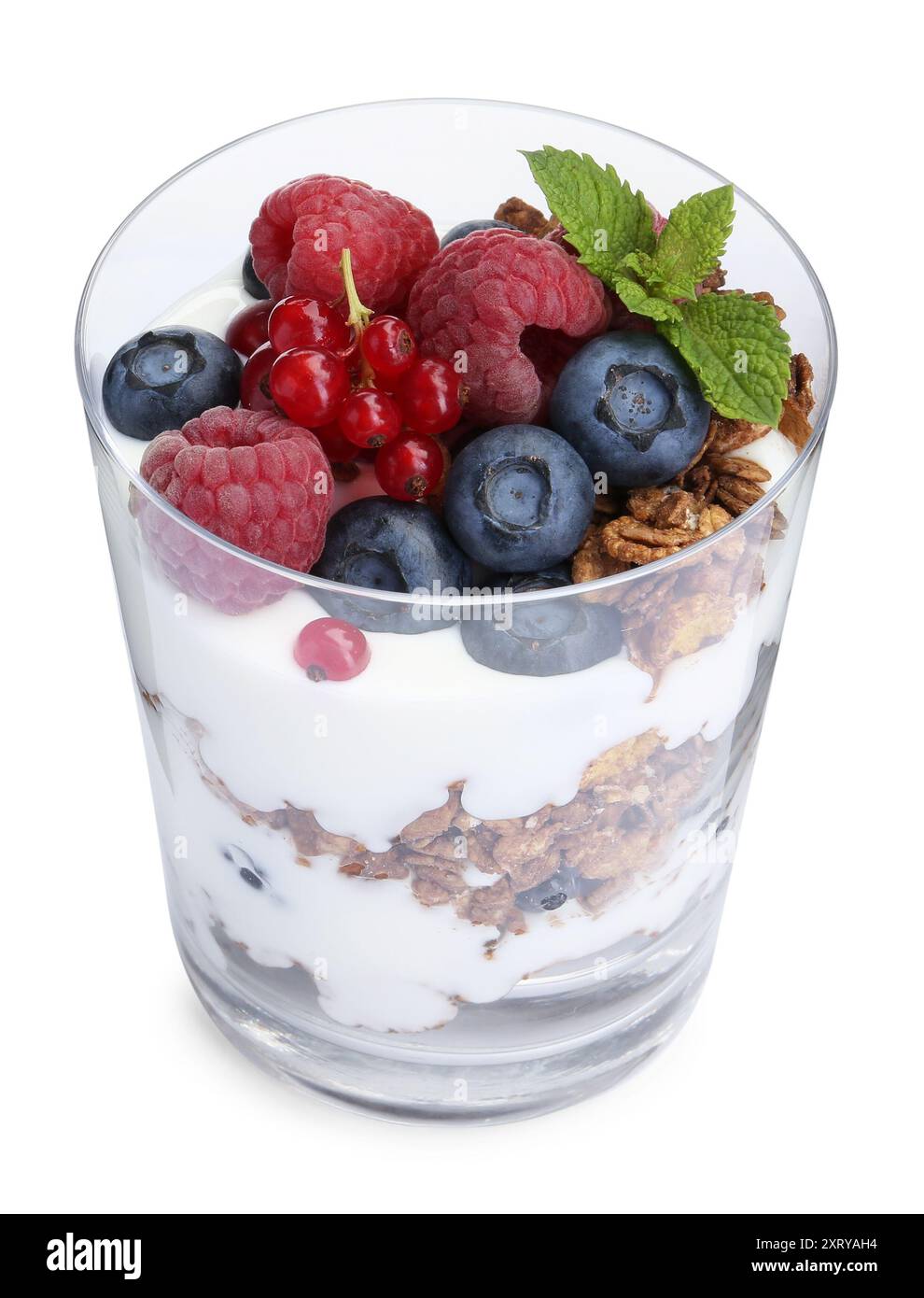 Tasty yogurt with fresh berries, granola and mint in glass isolated on ...