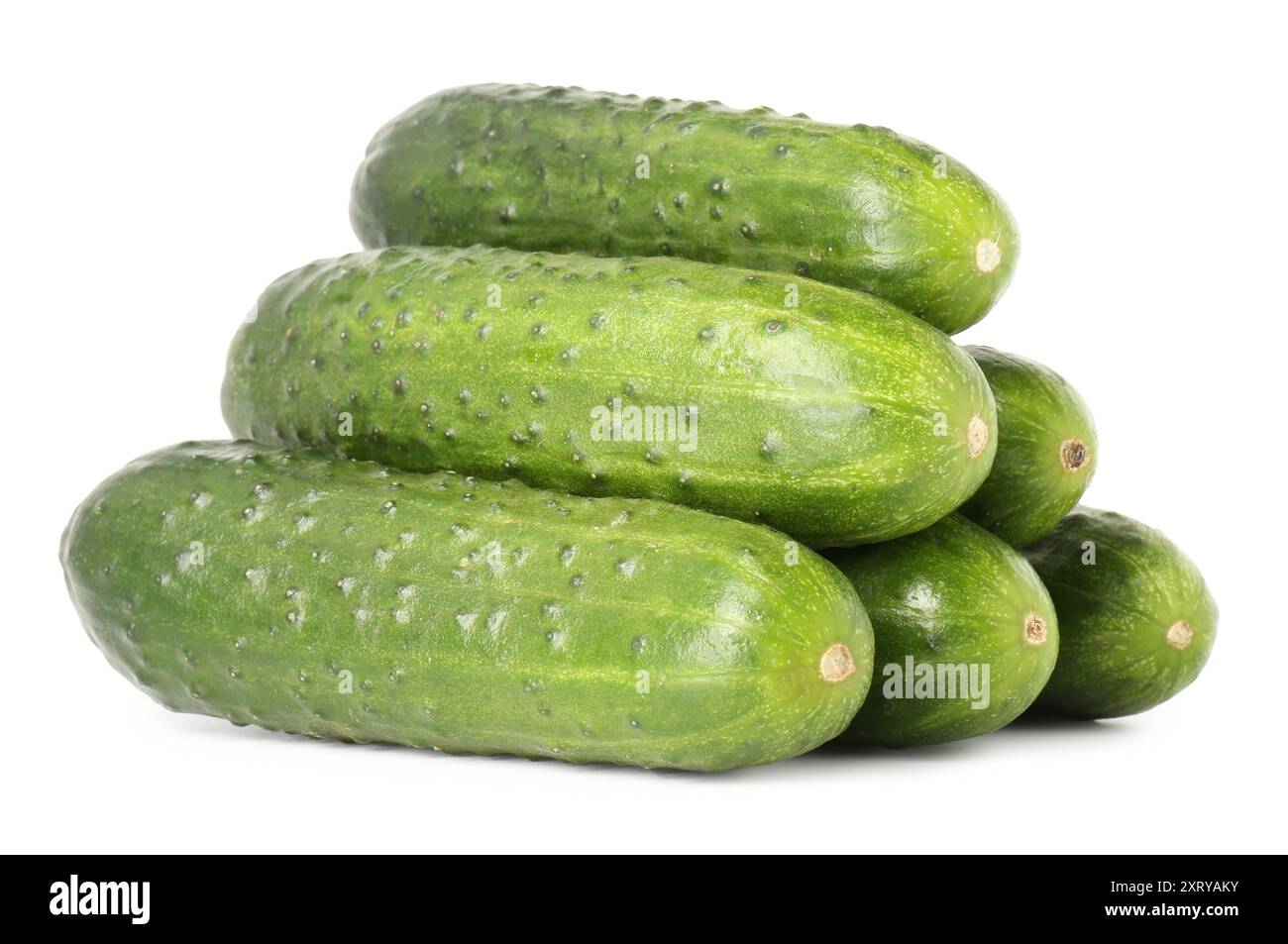 Pile of fresh cucumbers isolated on white Stock Photo - Alamy