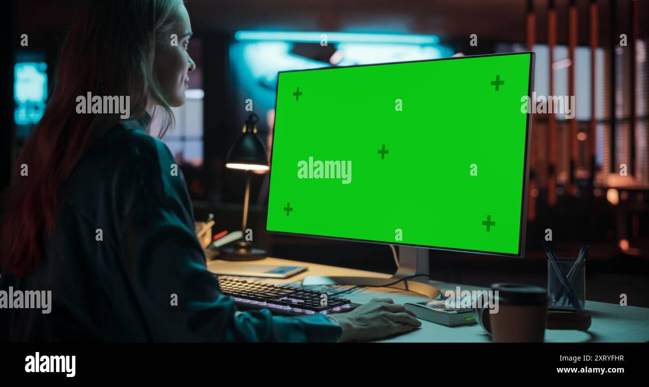 Over the Shoulder: Female Caucasian Specialist Working on Computer with ...