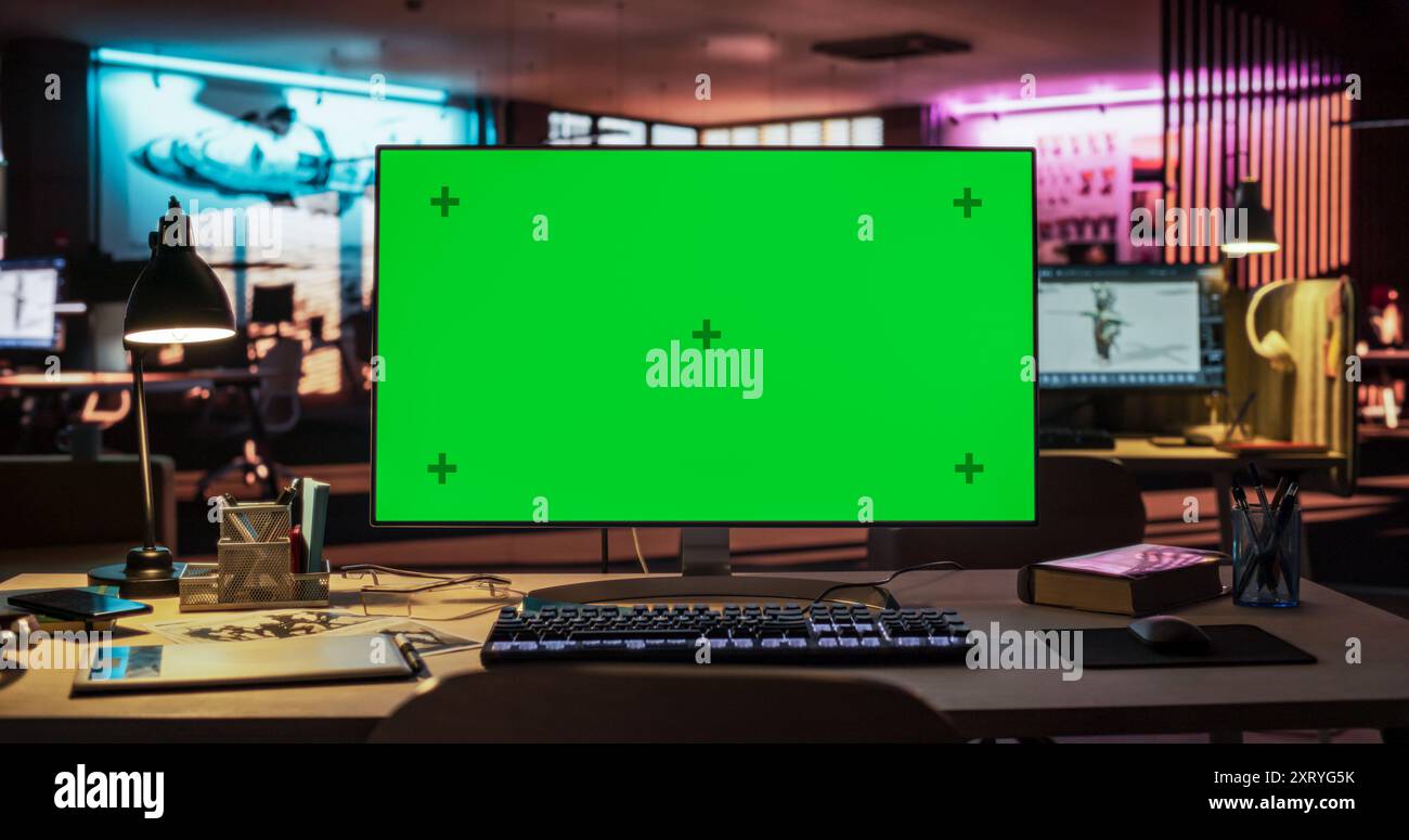 Desktop Computer with Mock Up Green Screen Chroma Key Display Standing on the Desk in the Empty ...