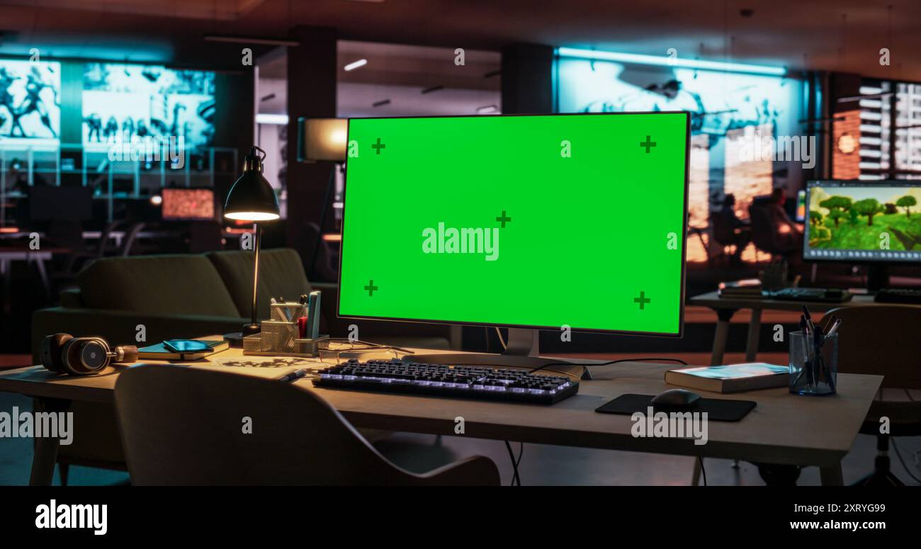 Desktop Computer with Mock Up Green Screen Chroma Key Display Standing on the Desk in the Empty ...