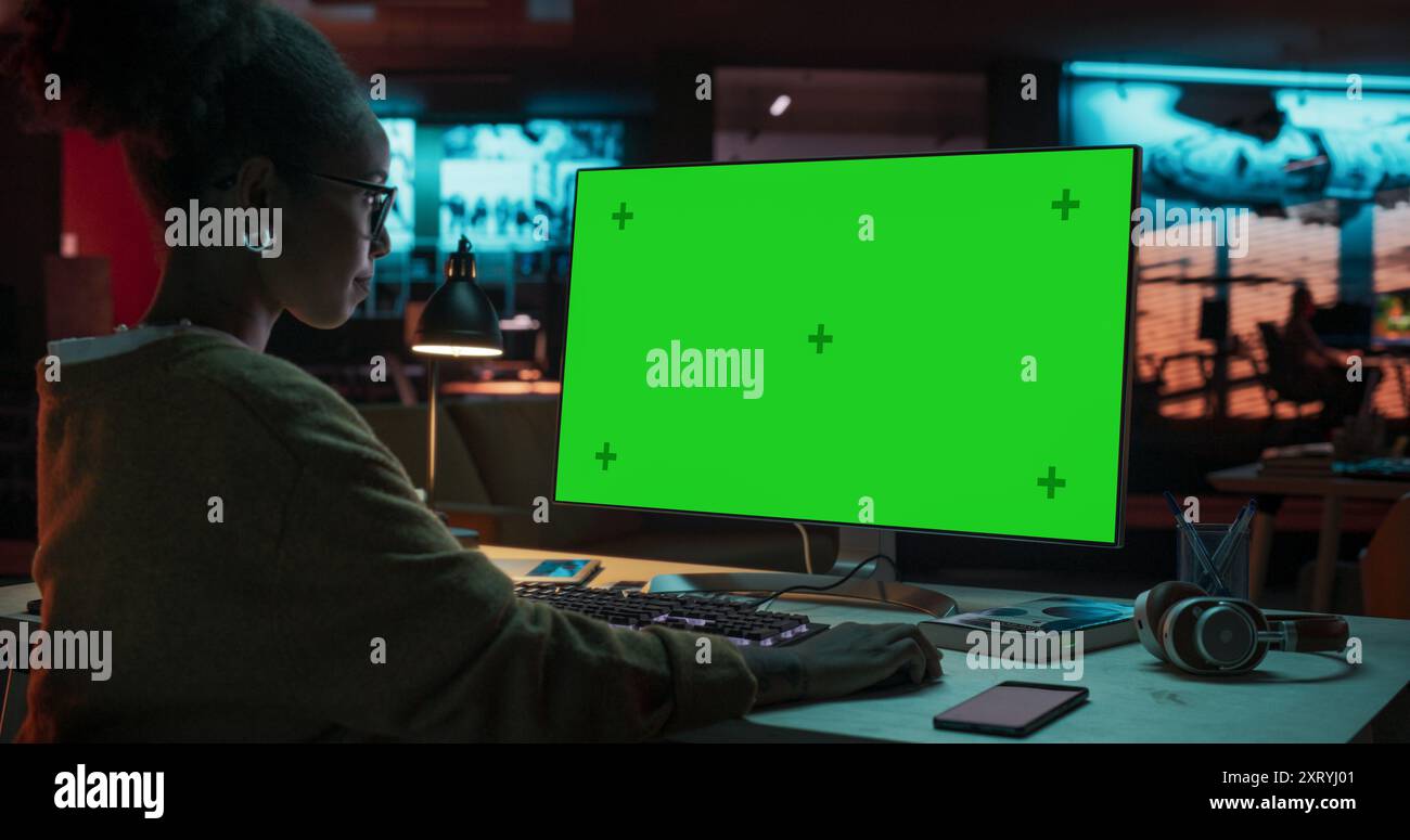 Portrait of Creative Black Woman Sitting at Her Desk Using Desktop ...
