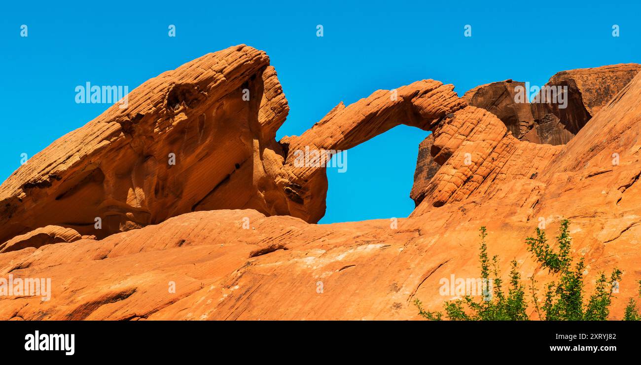 Valley of Fire Arch Rock has formed over many millennia by winds and ...