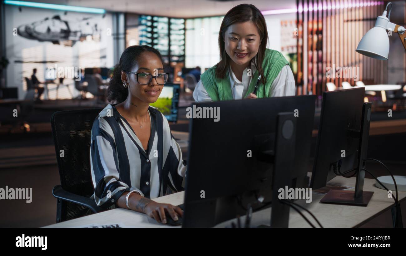 Asian Female Creative Director Giving Instructions on 3D Visuals to ...