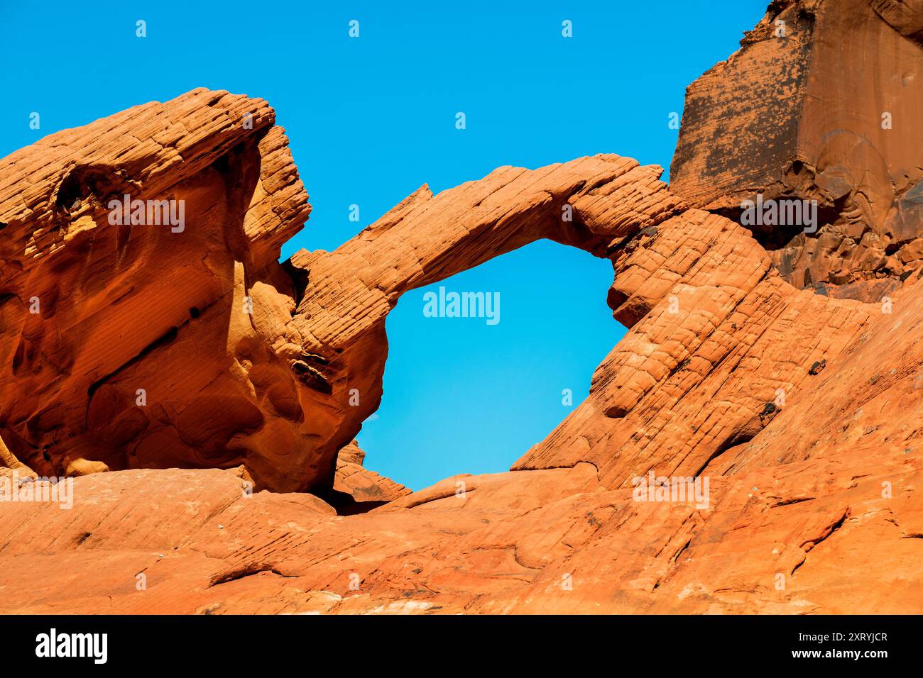 Valley of Fire Arch Rock has formed over many millennia by winds and ...