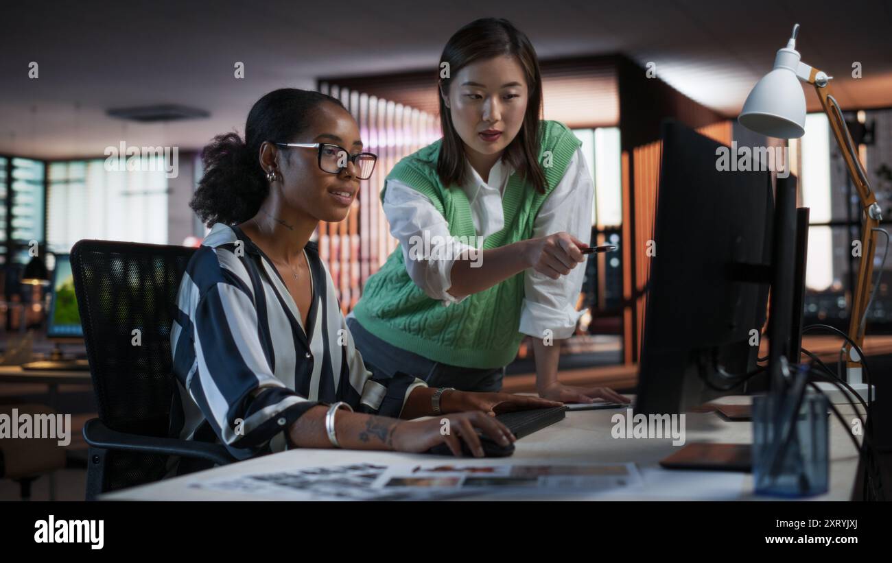 Asian Female Creative Director Giving Instructions on 3D Visuals to ...