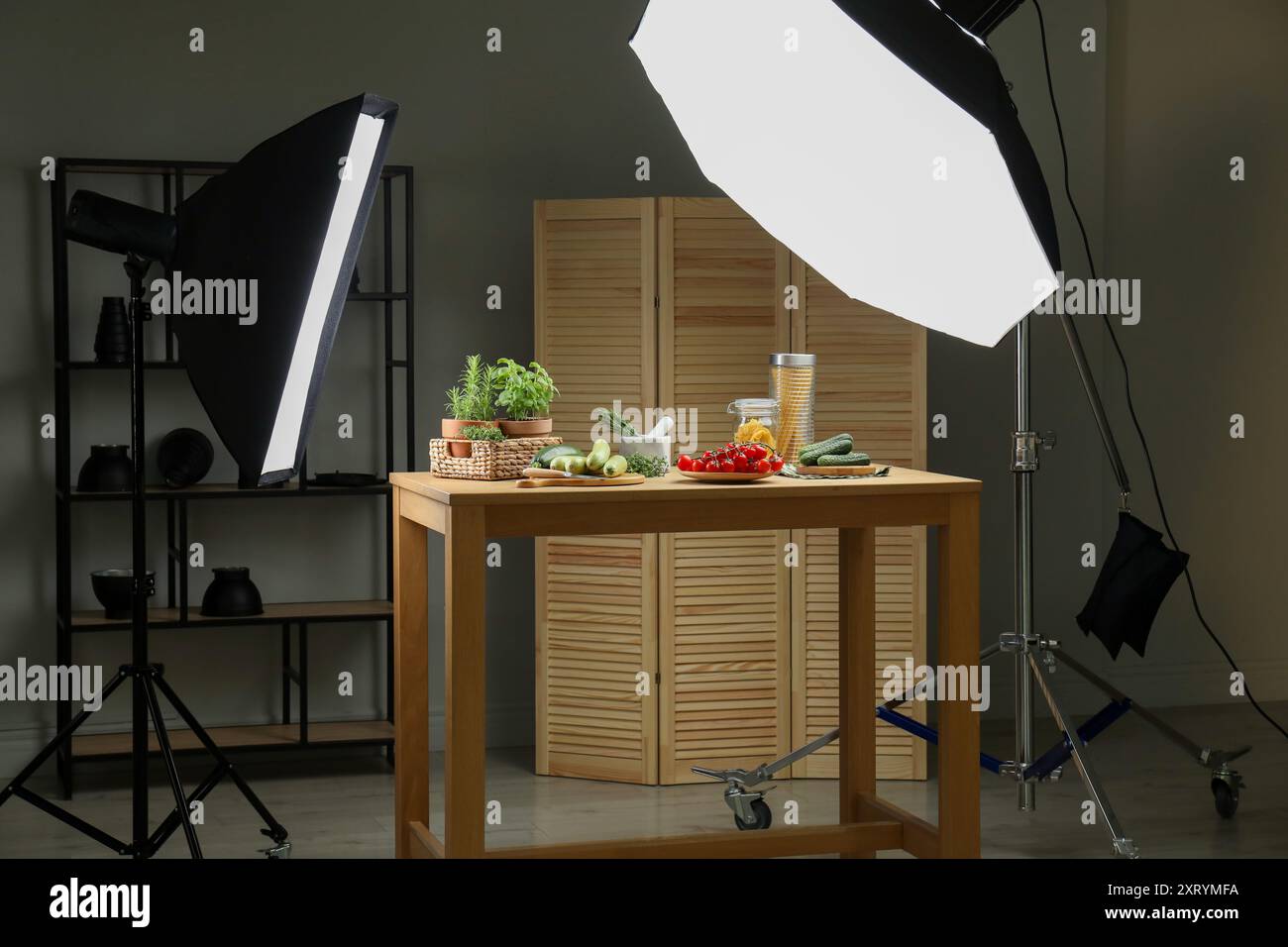 Shooting food in photo studio with professional lighting equipment ...