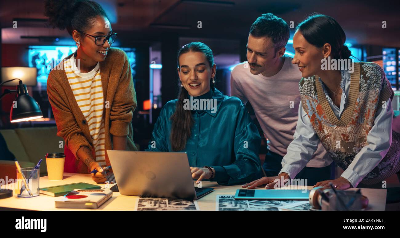 Multiethnic Group of People Use Laptop Computer to Discuss Work in ...